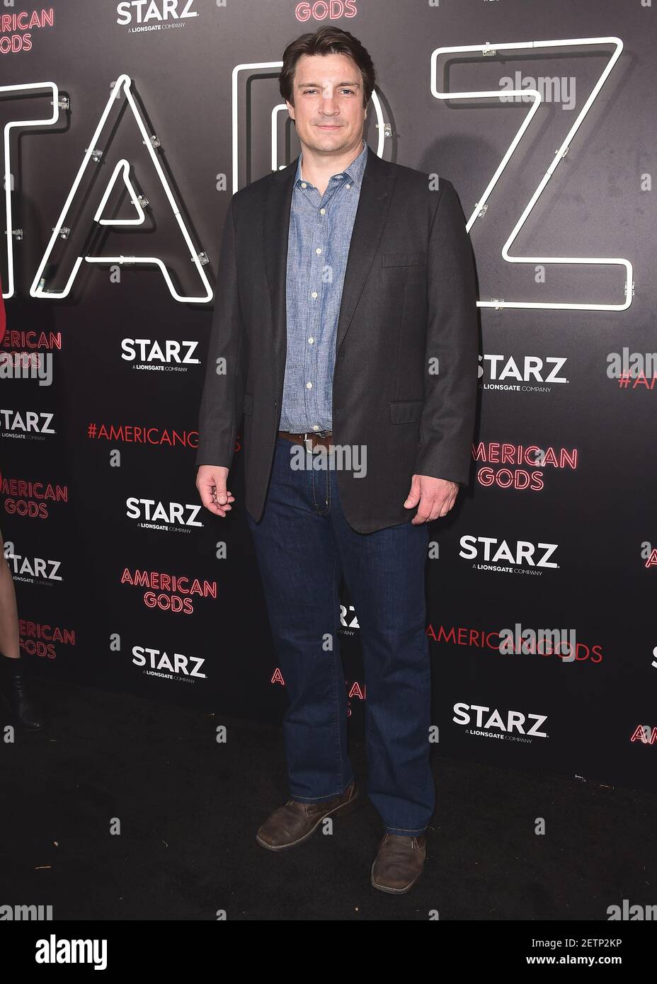 HOLLYWOOD, CA - APRIL 20: Nathan Fillion at the Los Angeles premiere of ...