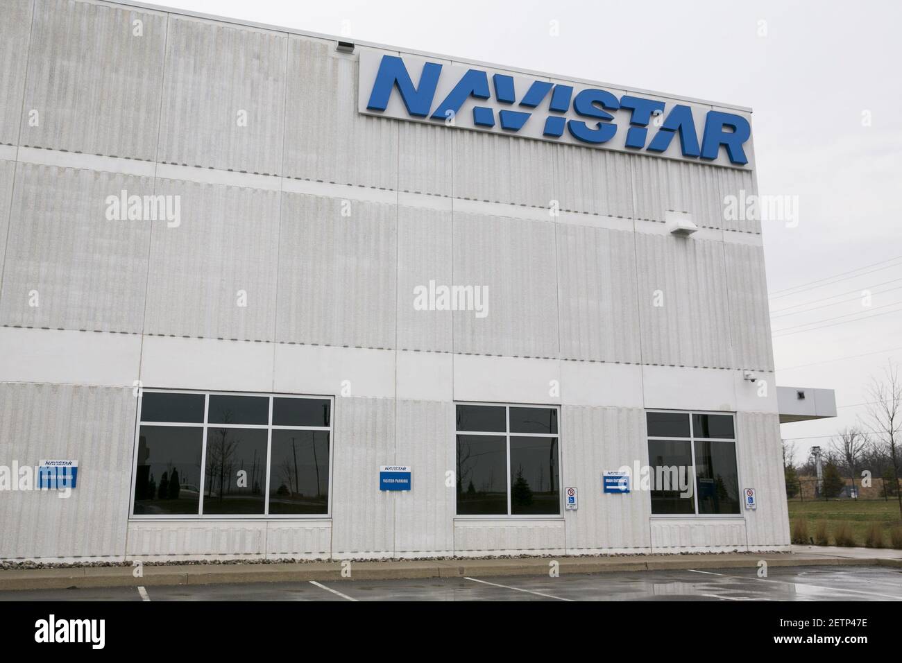 A logo sign outside of a facility occupied by Navistar in Hannon ...