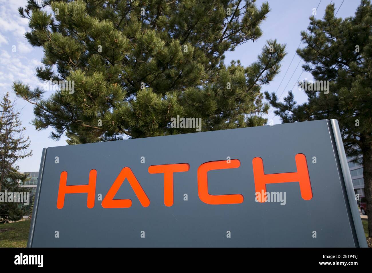A logo sign outside of the headquarters of Hatch in Mississauga ...