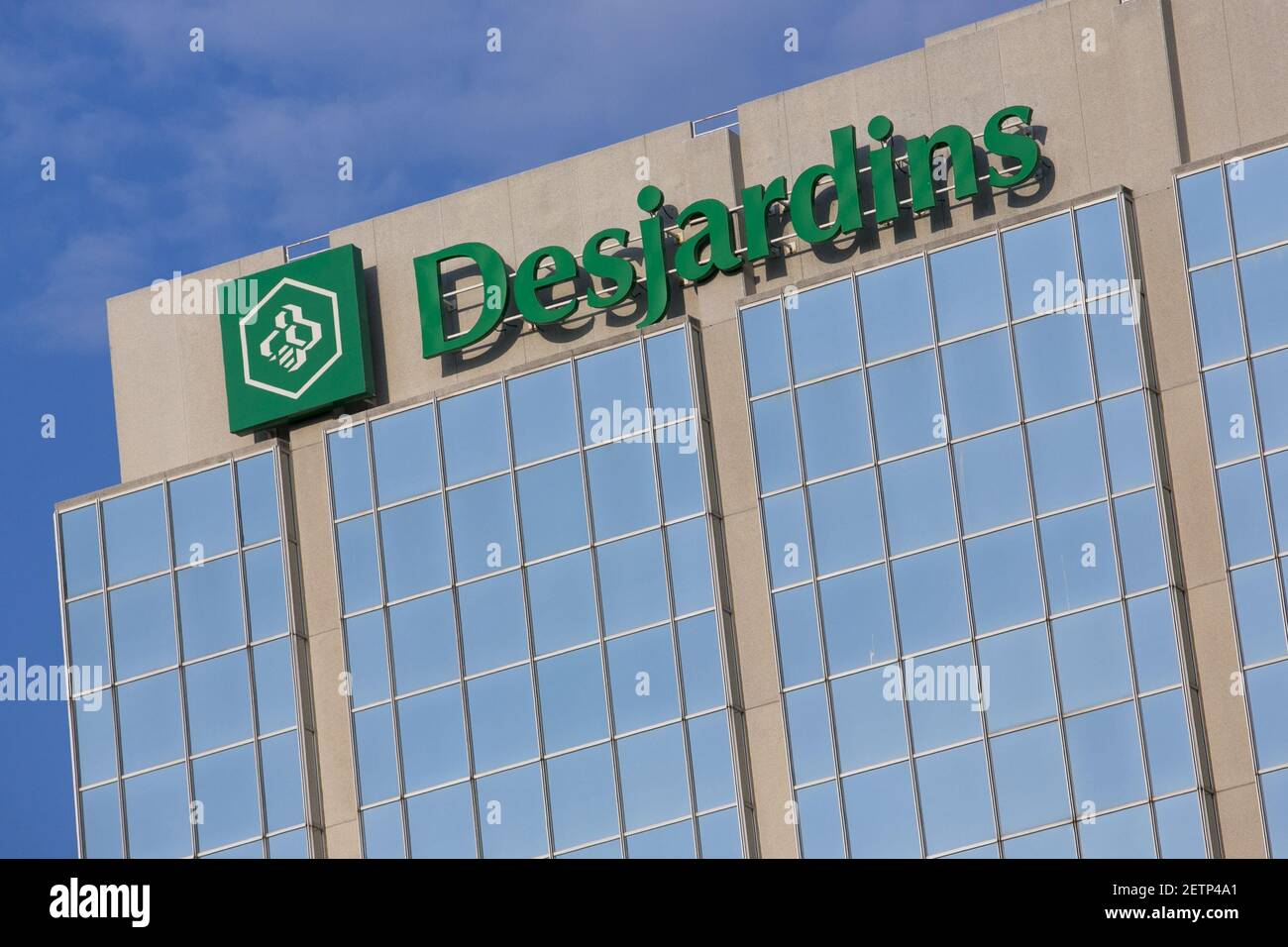 A logo sign outside of a facility occupied by The Desjardins Group in ...