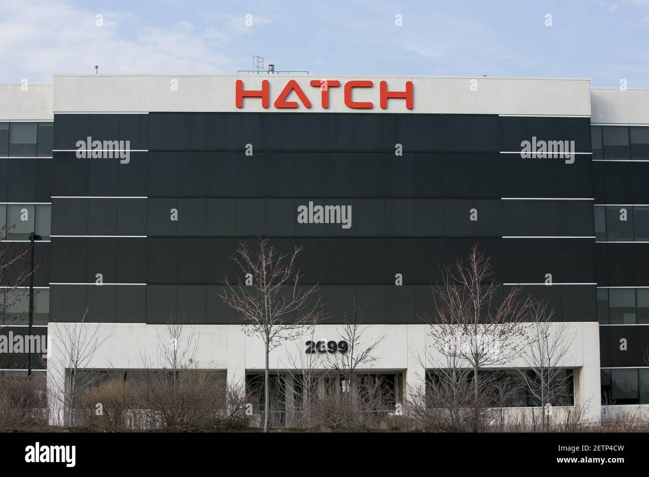 A logo sign outside of the headquarters of Hatch in Mississauga ...
