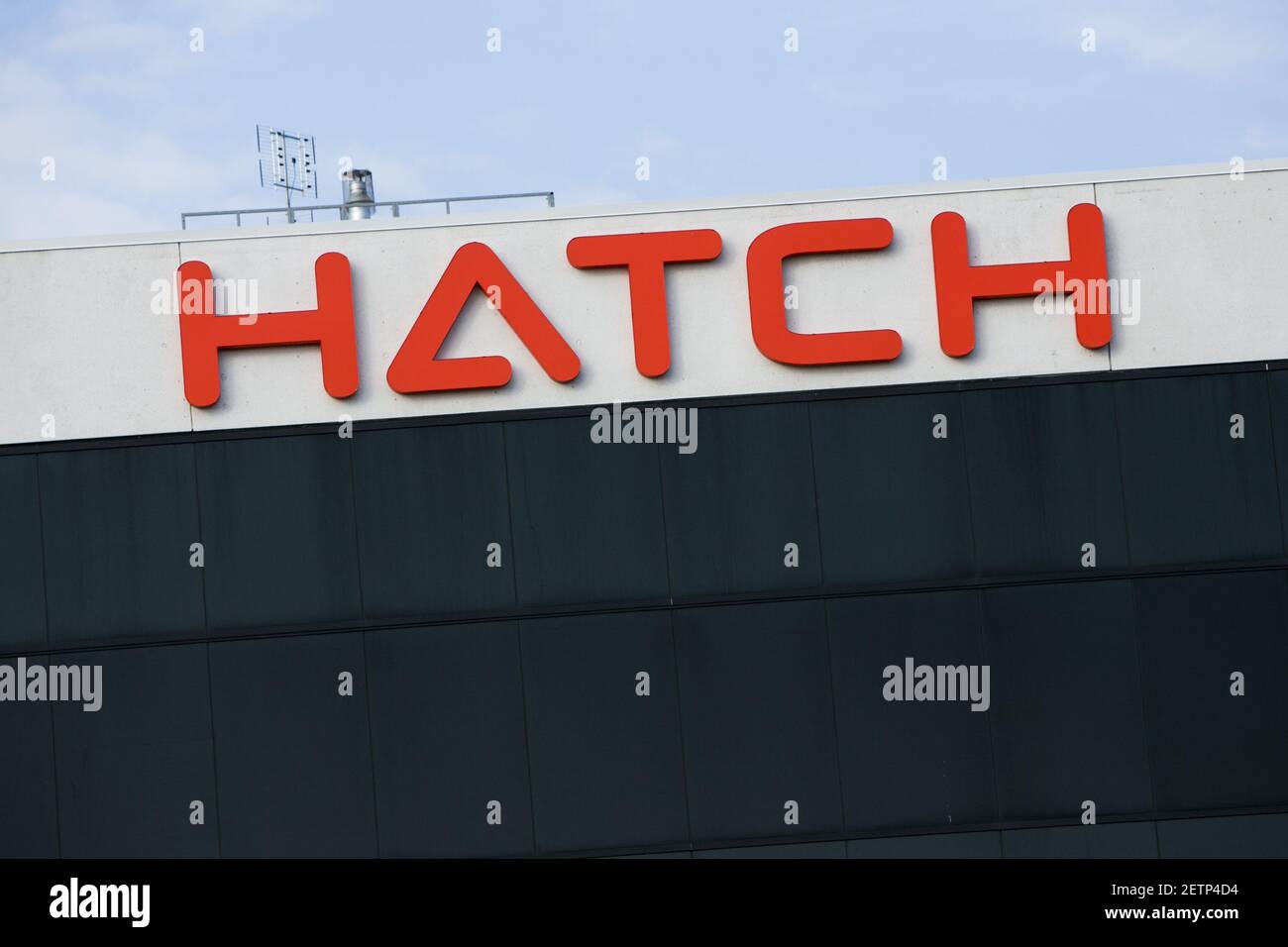 A logo sign outside of the headquarters of Hatch in Mississauga ...