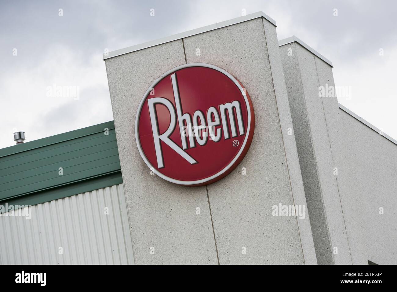 A logo sign outside of a facility occupied by the Rheem Manufacturing ...