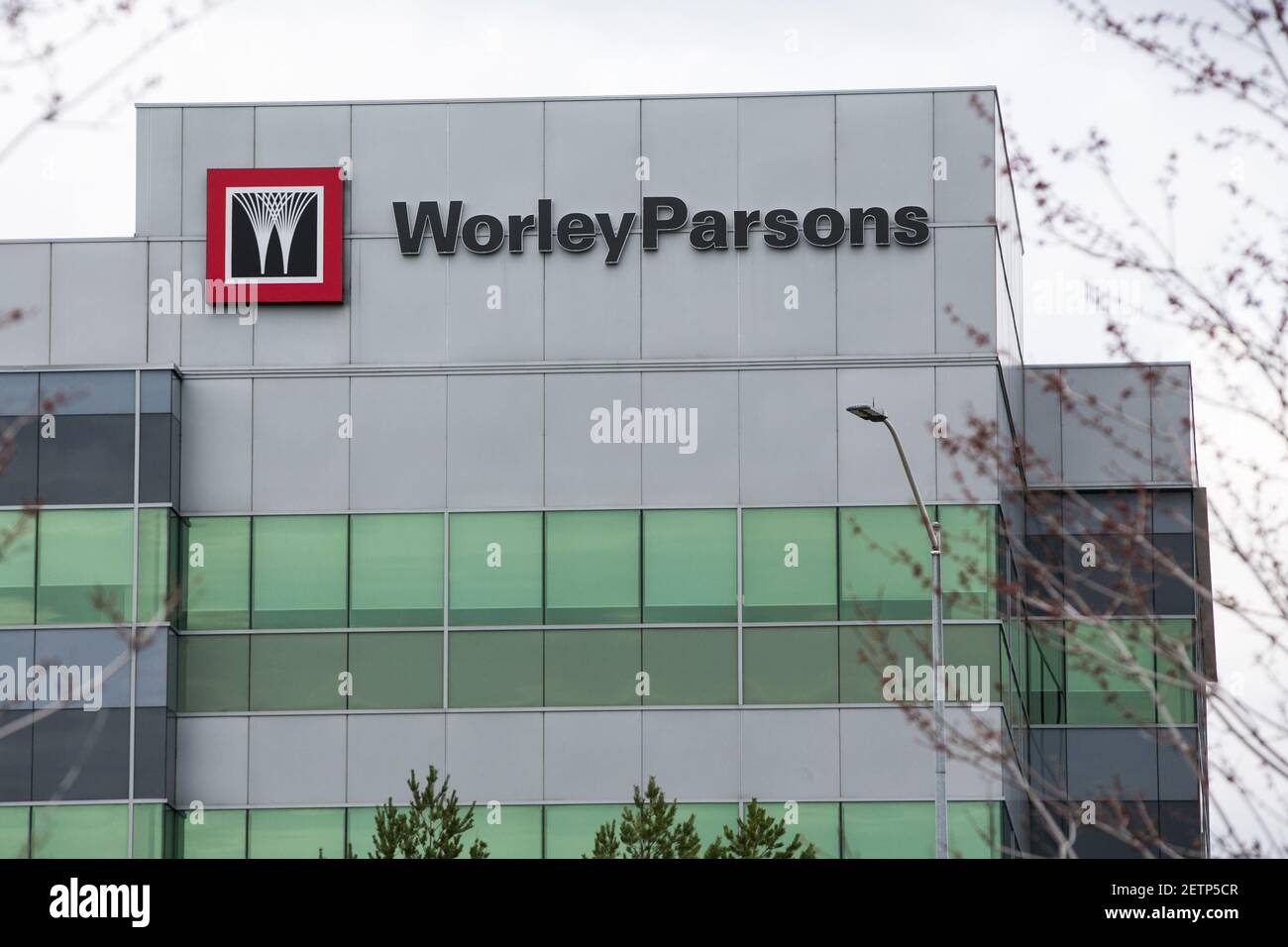 A logo sign outside of a facility occupied by WorleyParsons in ...