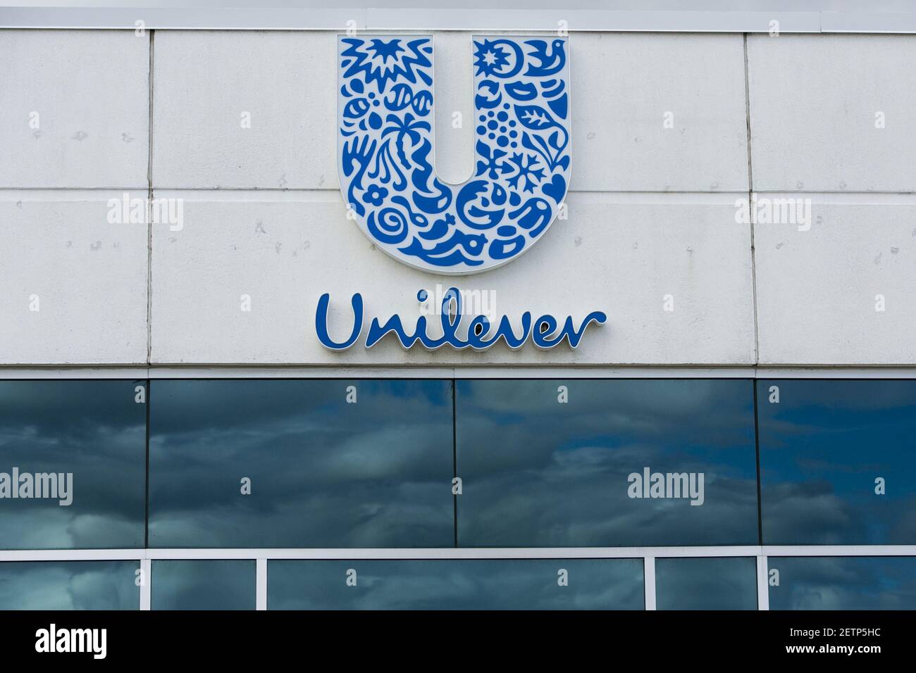 A logo sign outside of a facility occupied by Unilever in Mississauga ...