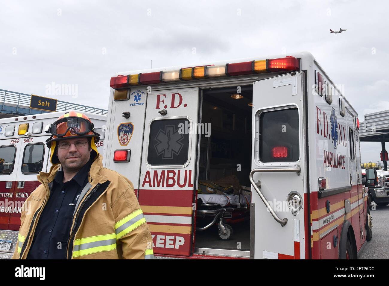 An EMT stands by his ambulance during the The Port Authority of New ...
