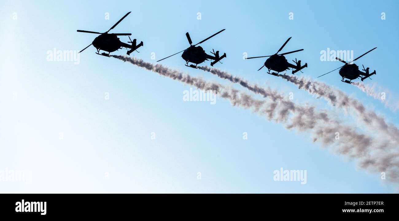 Indian Air Force Sarang helicopter air display team flying HAL Dhruv ...