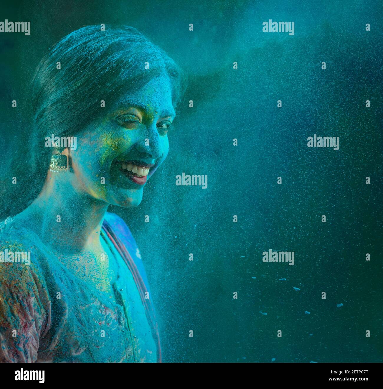 Confident young woman winking smiling hi-res stock photography and ...