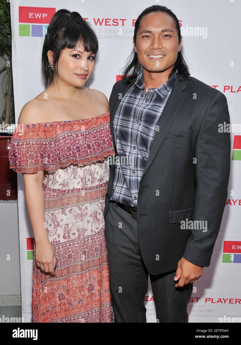 (L-R) Christina Fandino and Cedric Jonathan Pang at the East West ...