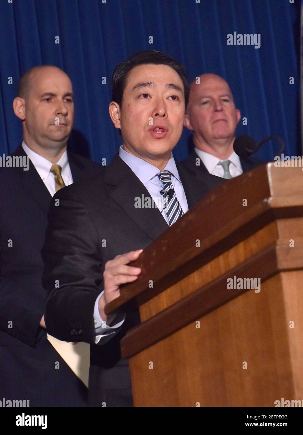 Acting US Attorney Joon H. Kim announces the arrest of former police ...