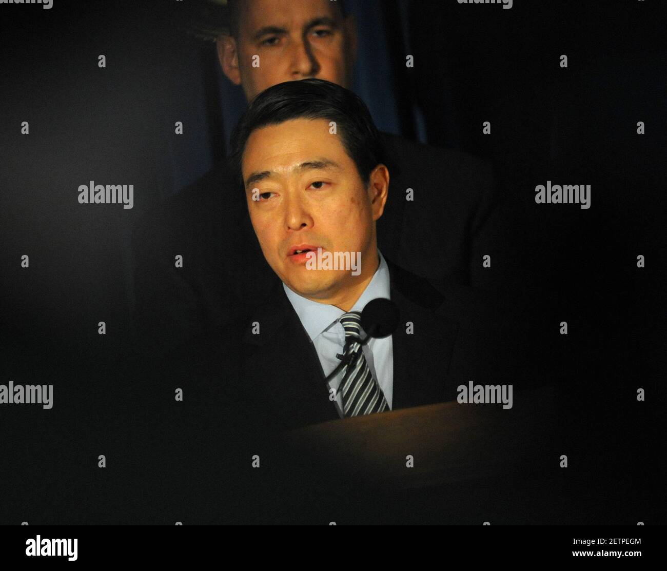 Acting US Attorney Joon H. Kim announces the arrest of former police ...