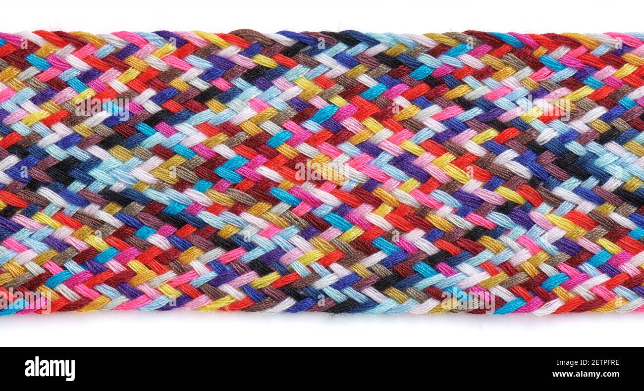 A braid of multi colored sewing threads on a white background Stock ...