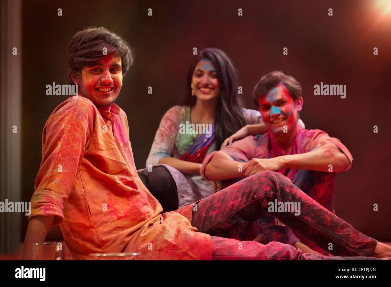 Young adults sitting together hi-res stock photography and images - Alamy