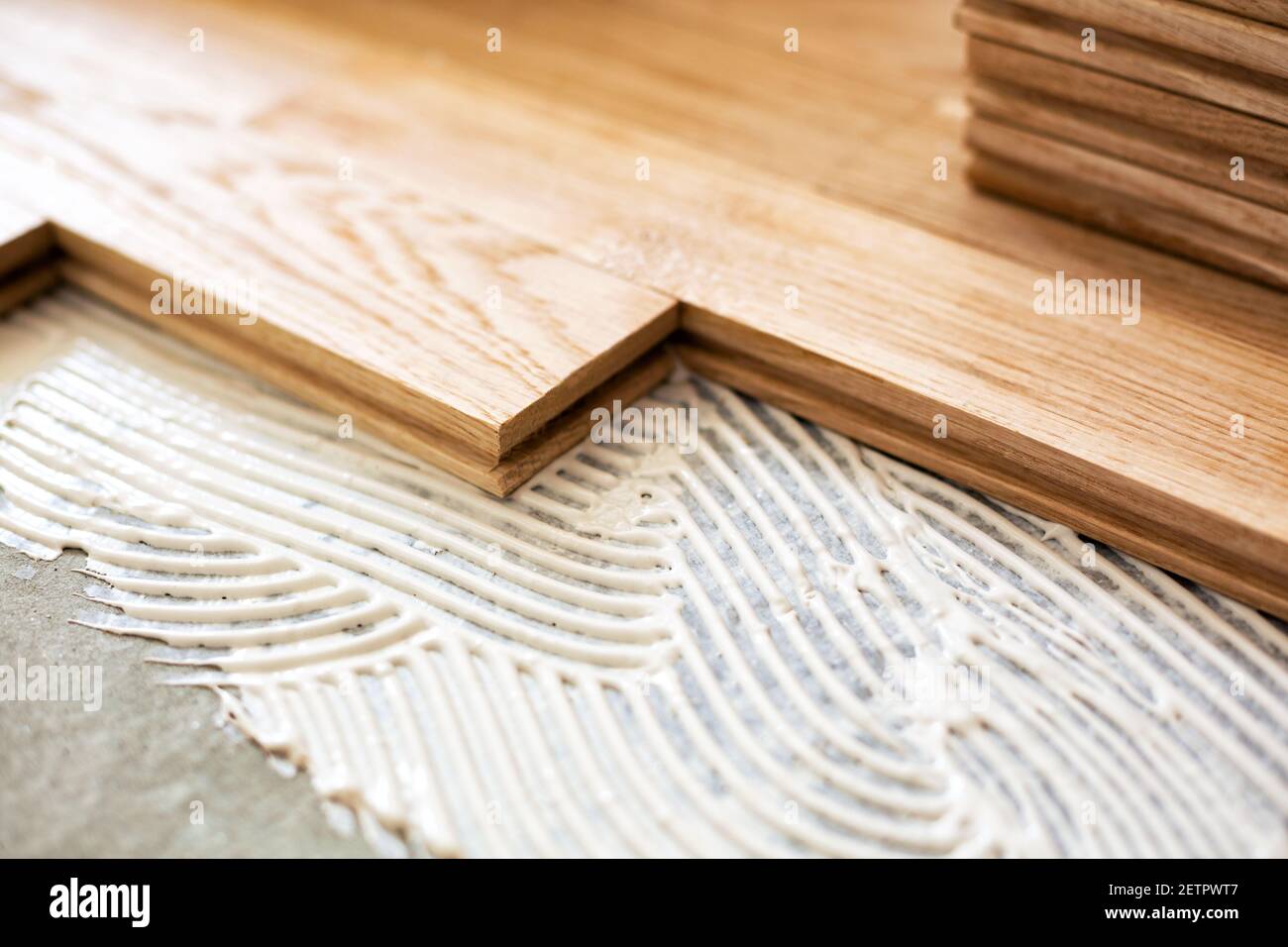 Closeup of parquet sockets for alignment precision pointing to the ...