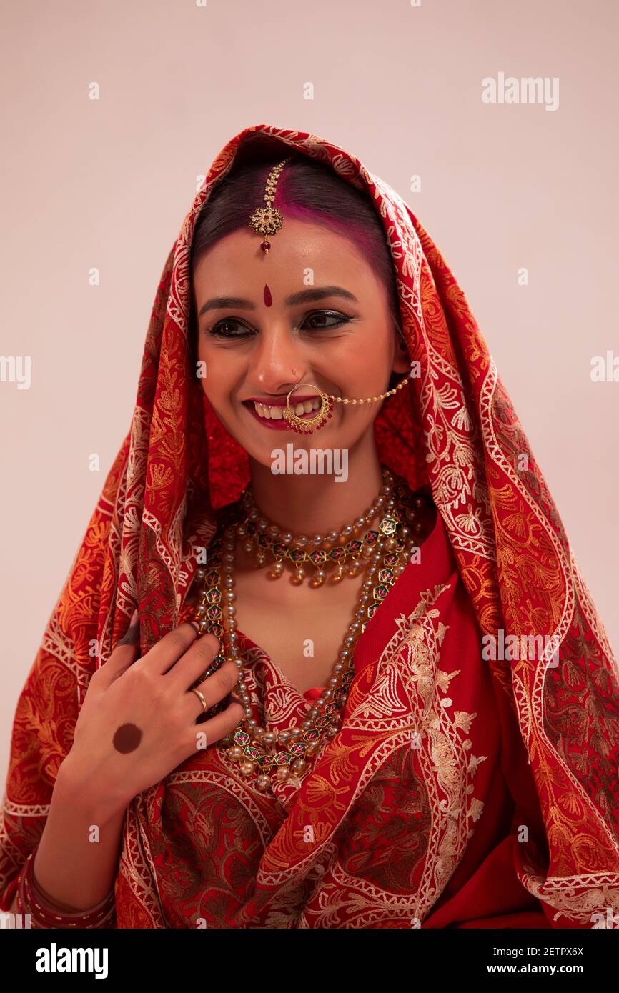 Person in traditional attire smiling hi-res stock photography and ...