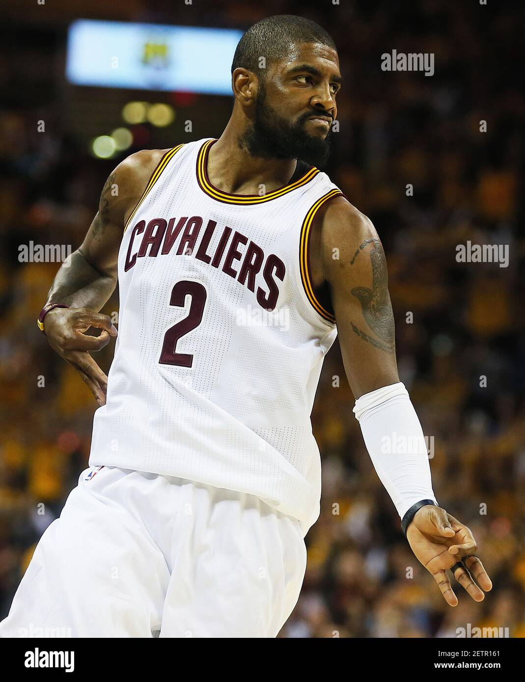 Cleveland Cavaliers guard Kyrie Irving celebrates a three-pointer ...