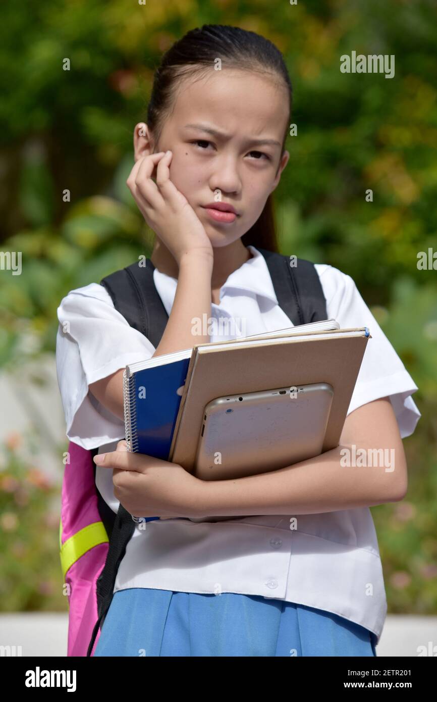 An Unhappy Cute Filipina Person Stock Photo - Alamy