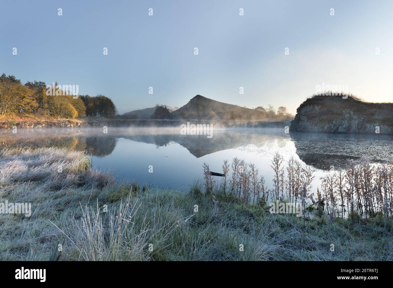 Cawfield Quarry pool at dawn, Hadrian's Wall, Northumberland, UK Stock ...