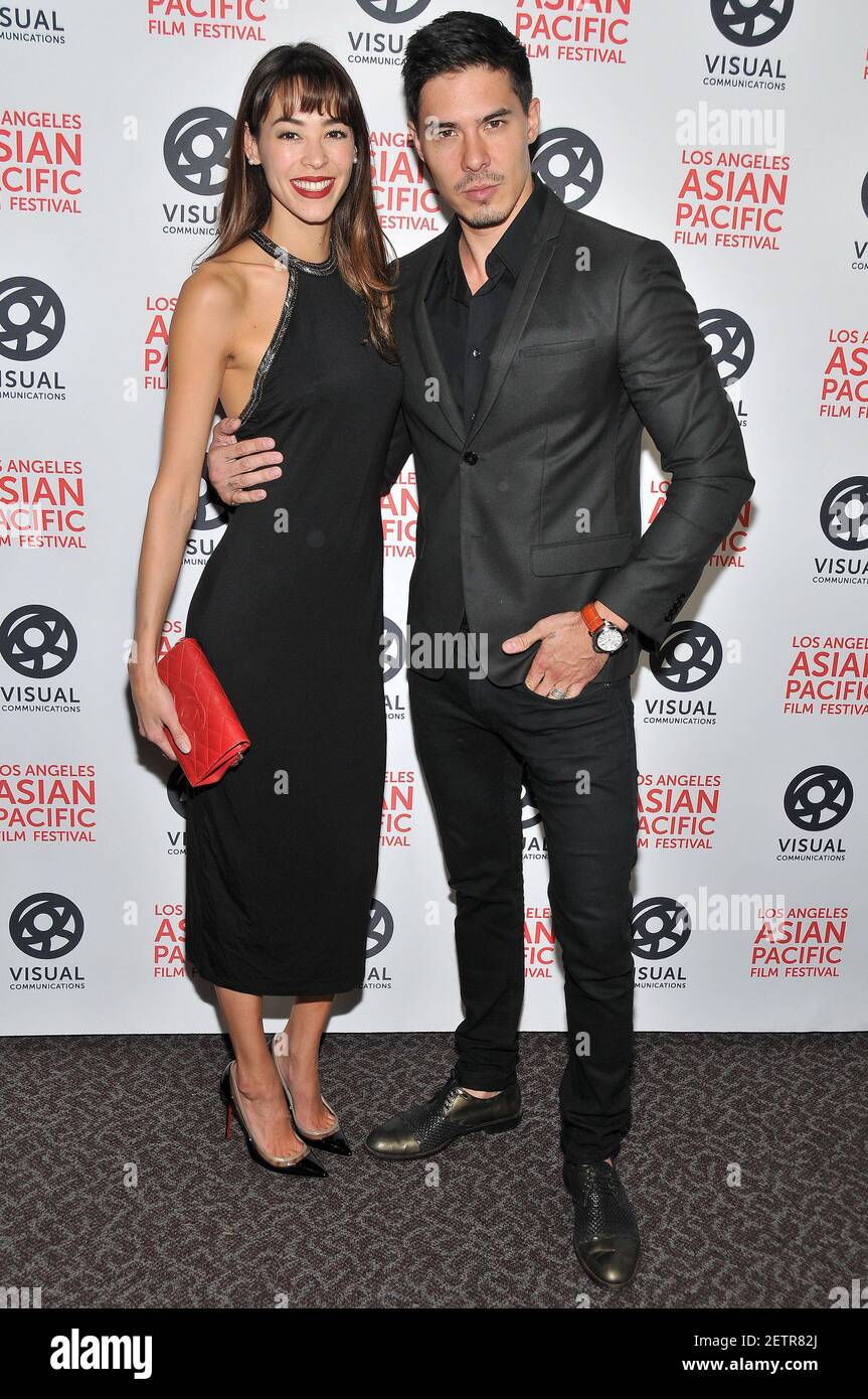 (L-R) Model Emi Renata and Actor Lewis Tan at the 2017 Los Angeles ...