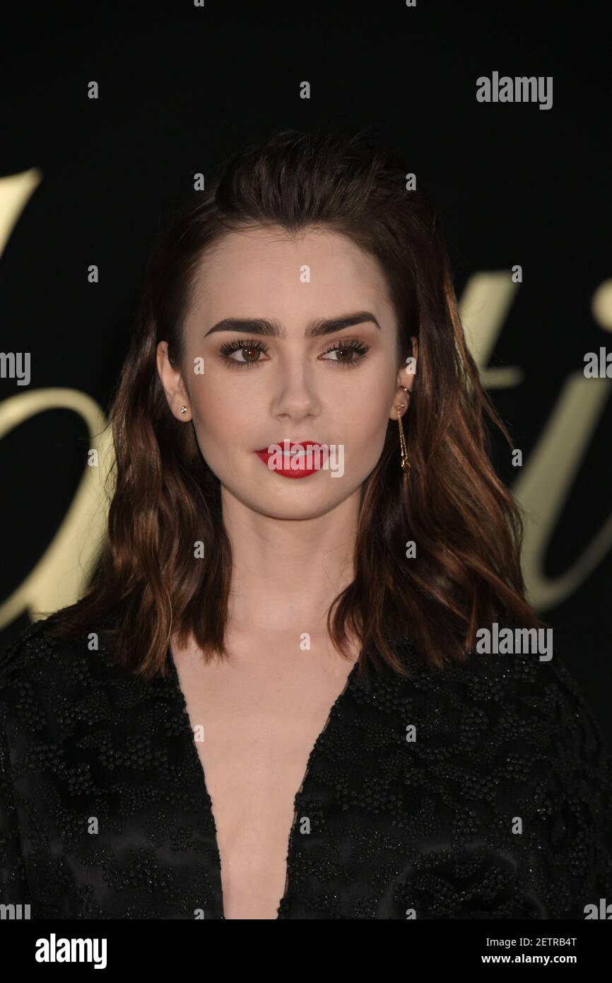 Lily Collins wearing Cartier jewelry arrives to the Cartier Los Angeles ...