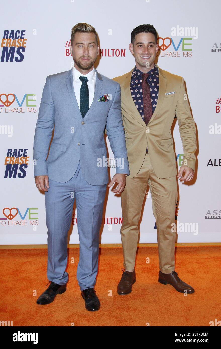 Singer Lance Bass and actor Michael Turchin attend the 24th Annual Race ...