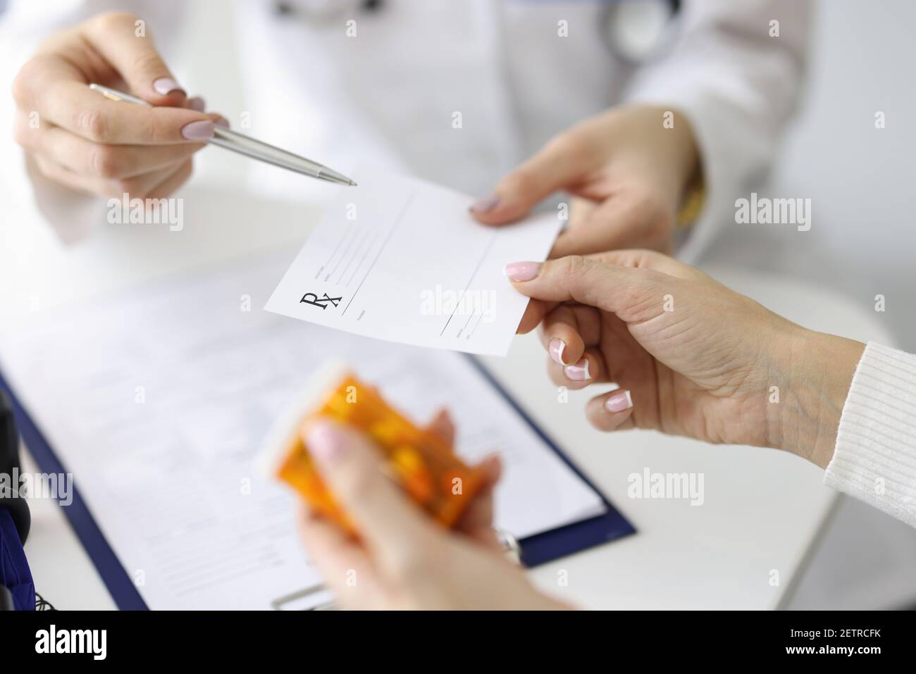 Doctor giving patient paper prescription for medicine closeup Stock ...