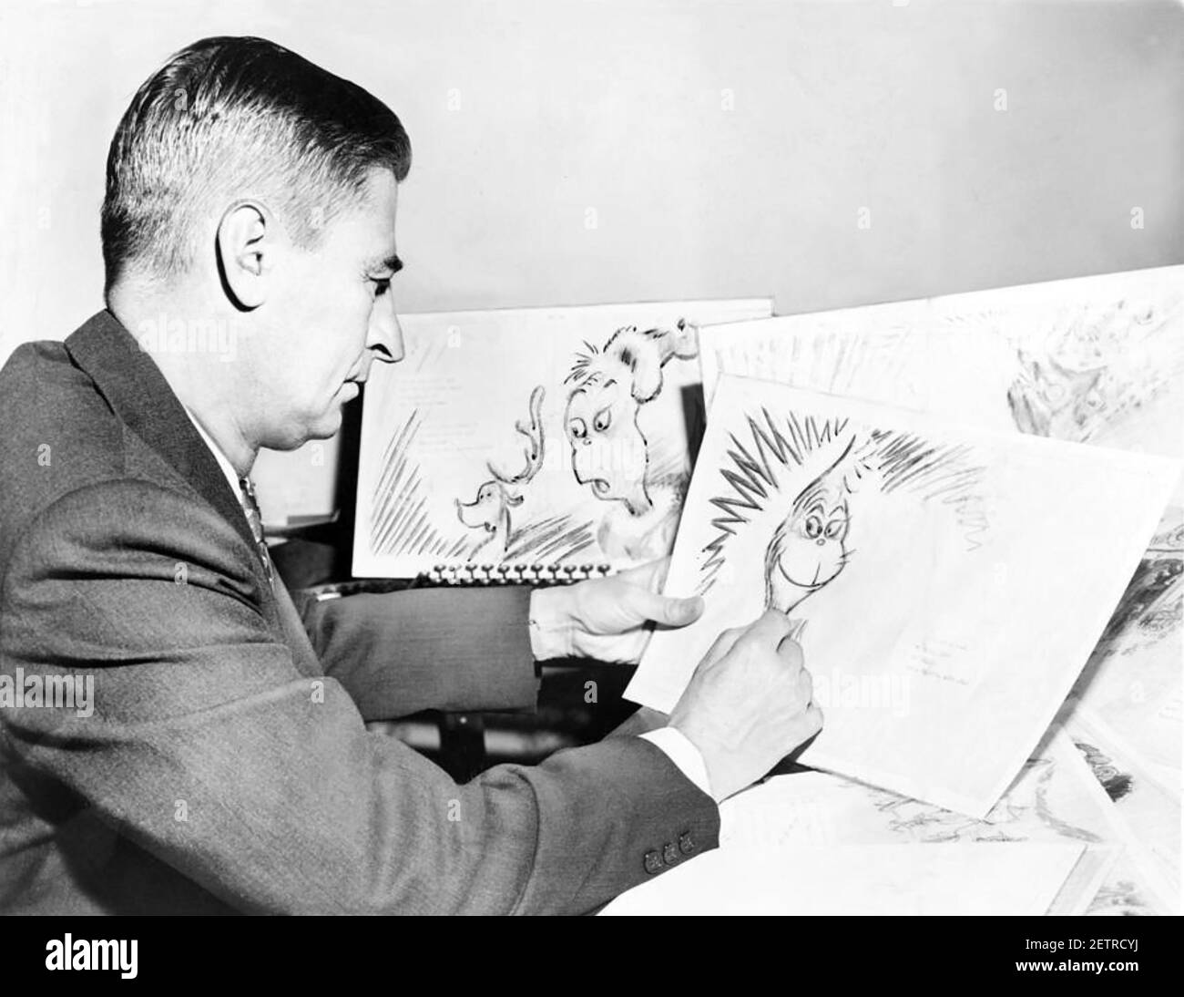 TED GEISEL (1904-1991) American author working on one of his Dr Seuss ...