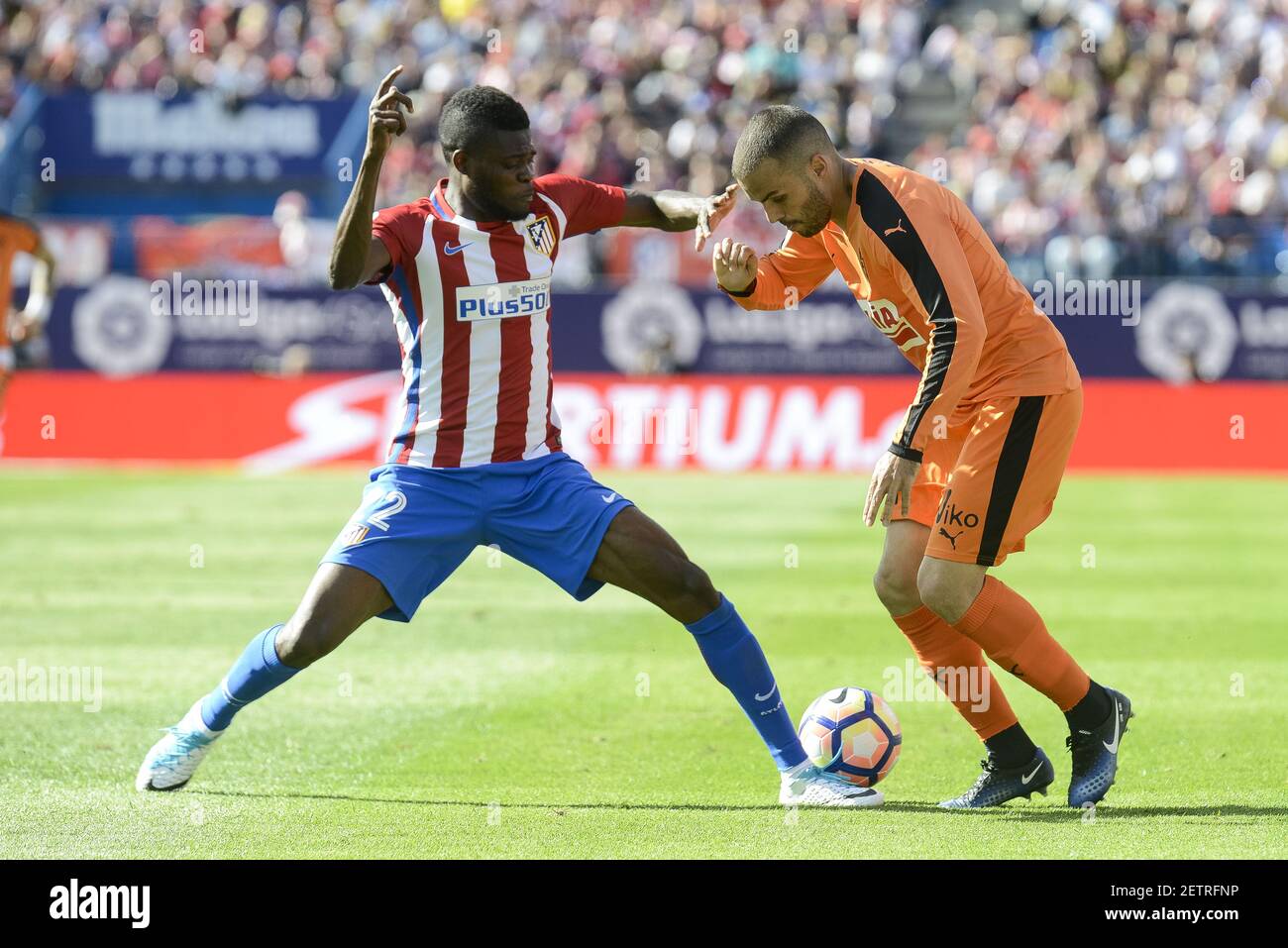 Atletico de Madrid's Thomas Teye and SD Eibar's David Junca Reñe during ...