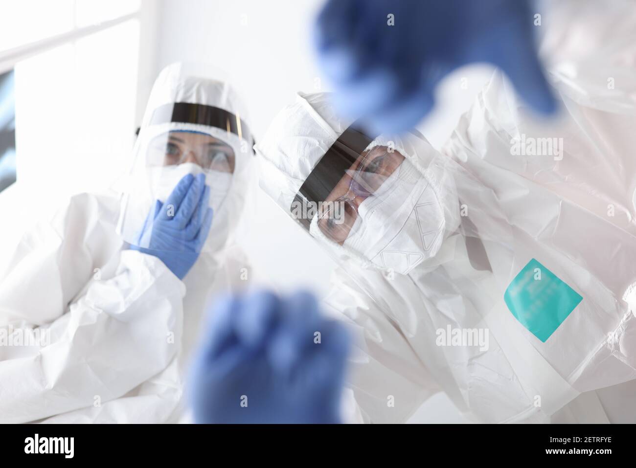 Isolation suits hi-res stock photography and images - Alamy