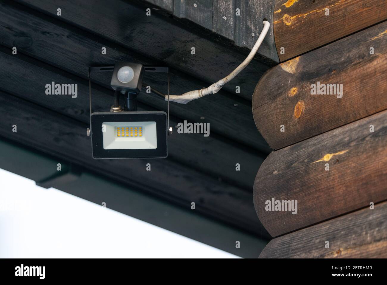 LED floodlight with sensor at home. How to install a floodlight ...