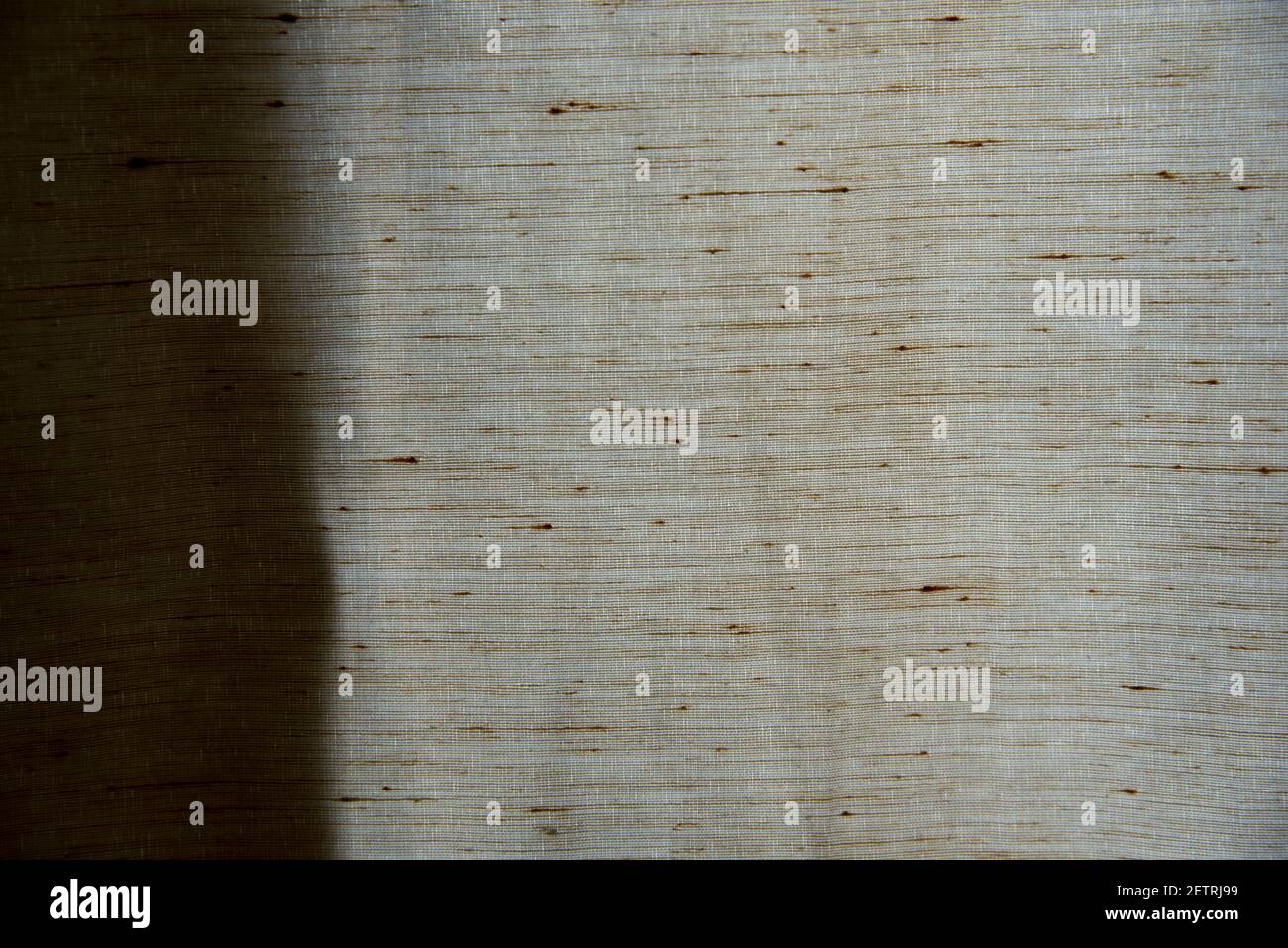 A beige curtain fabric texture background Stock Photo - Alamy
