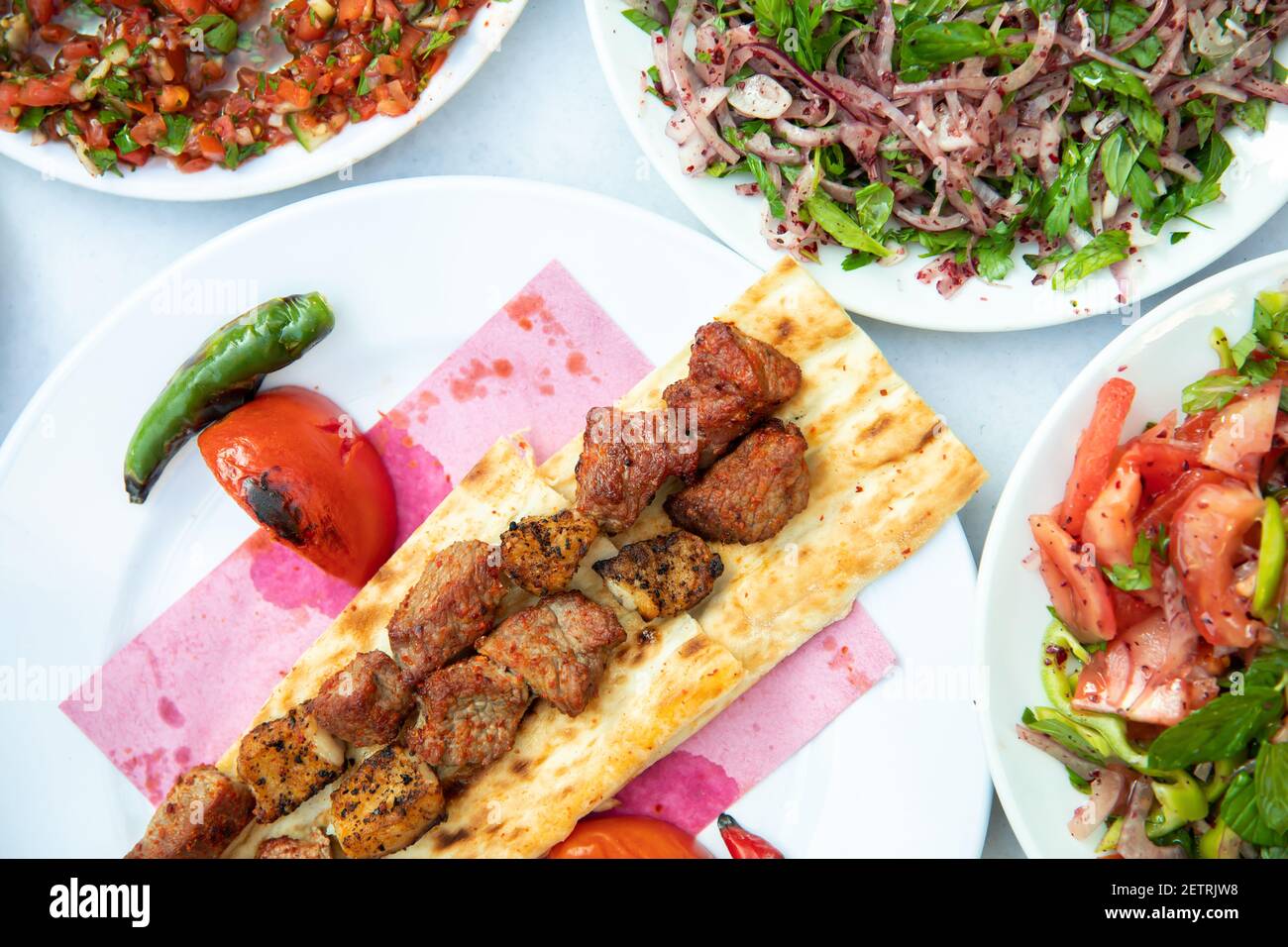Traditional Turkish grilled shish kebab or barbecued shashlik meat ...