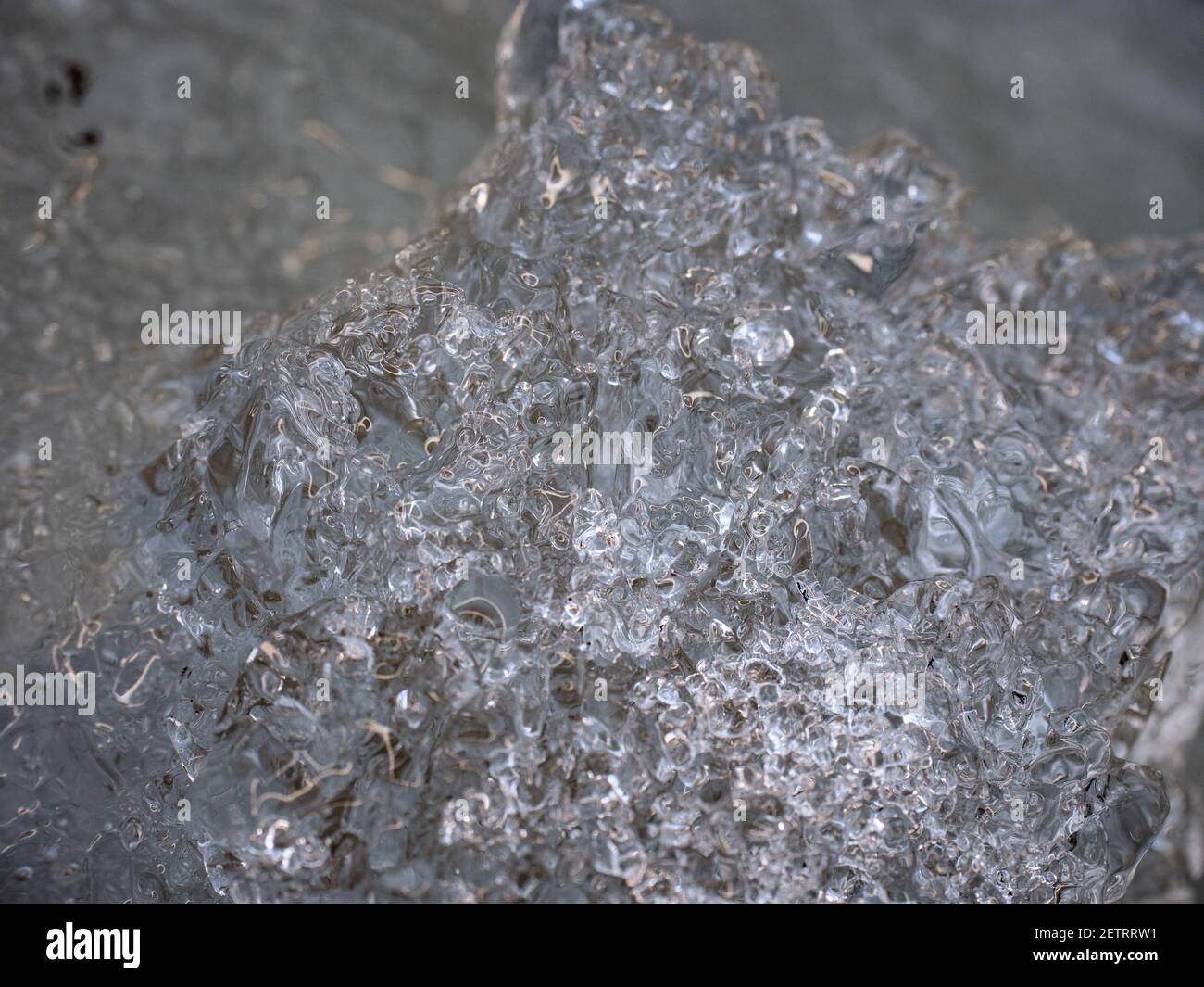 Melting ice pieces flowing on water surface. Ice drift on the river ...