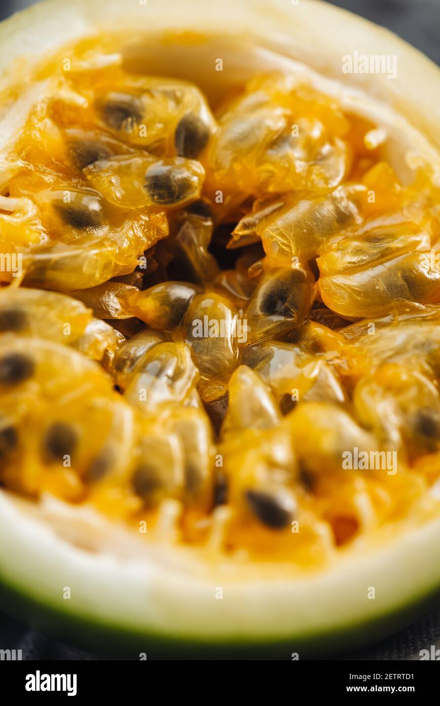 Fresh and juicy raw maracuja fruit on a table Stock Photo - Alamy