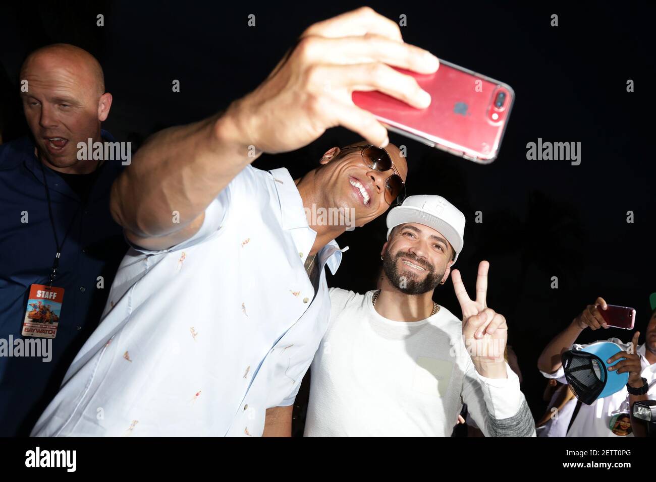 Dwayne Johnson and Singer Nacho are seen during arrivals at the ...