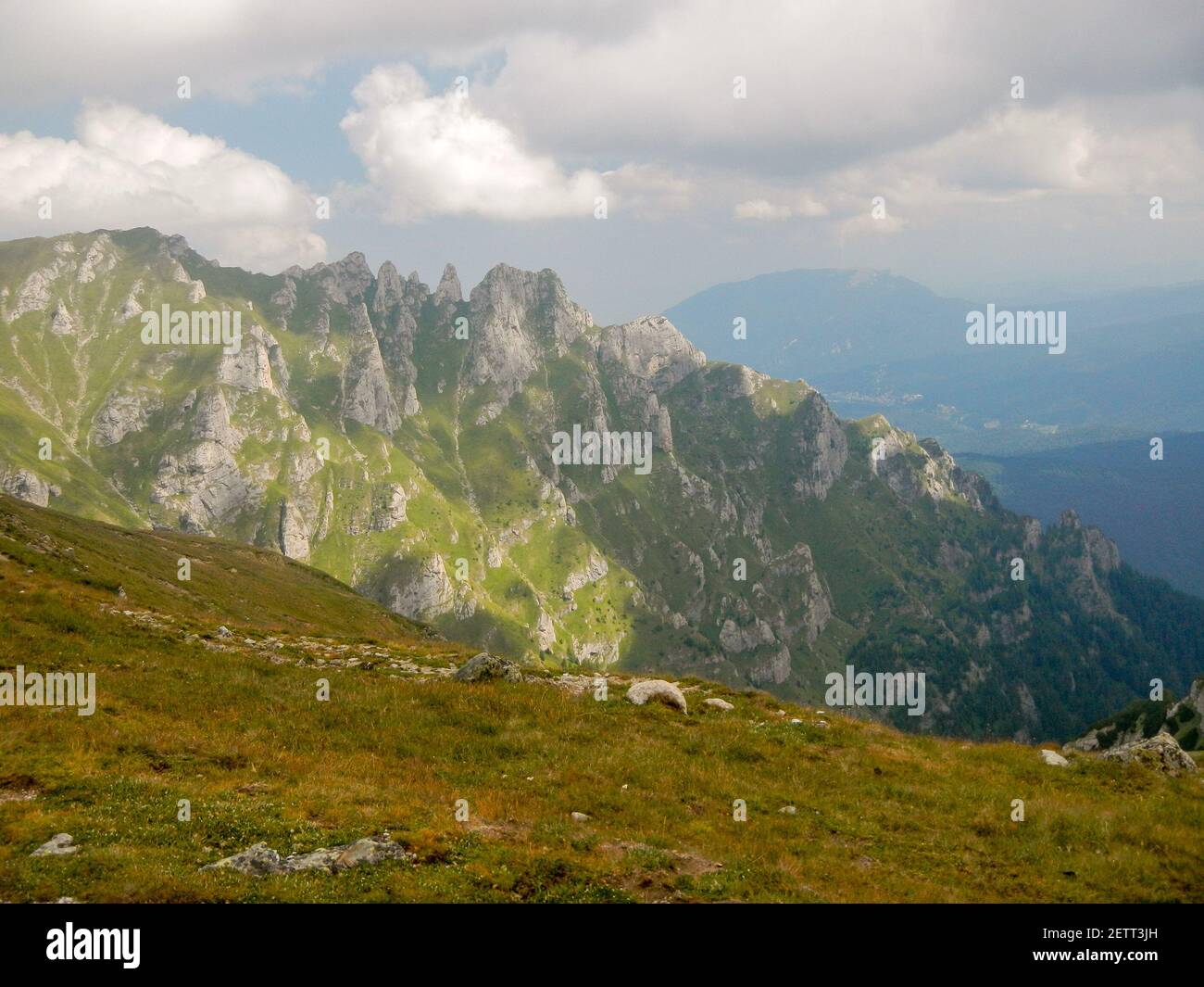 A beautiful view of the green Fagaras mountains against the cloudy sky ...