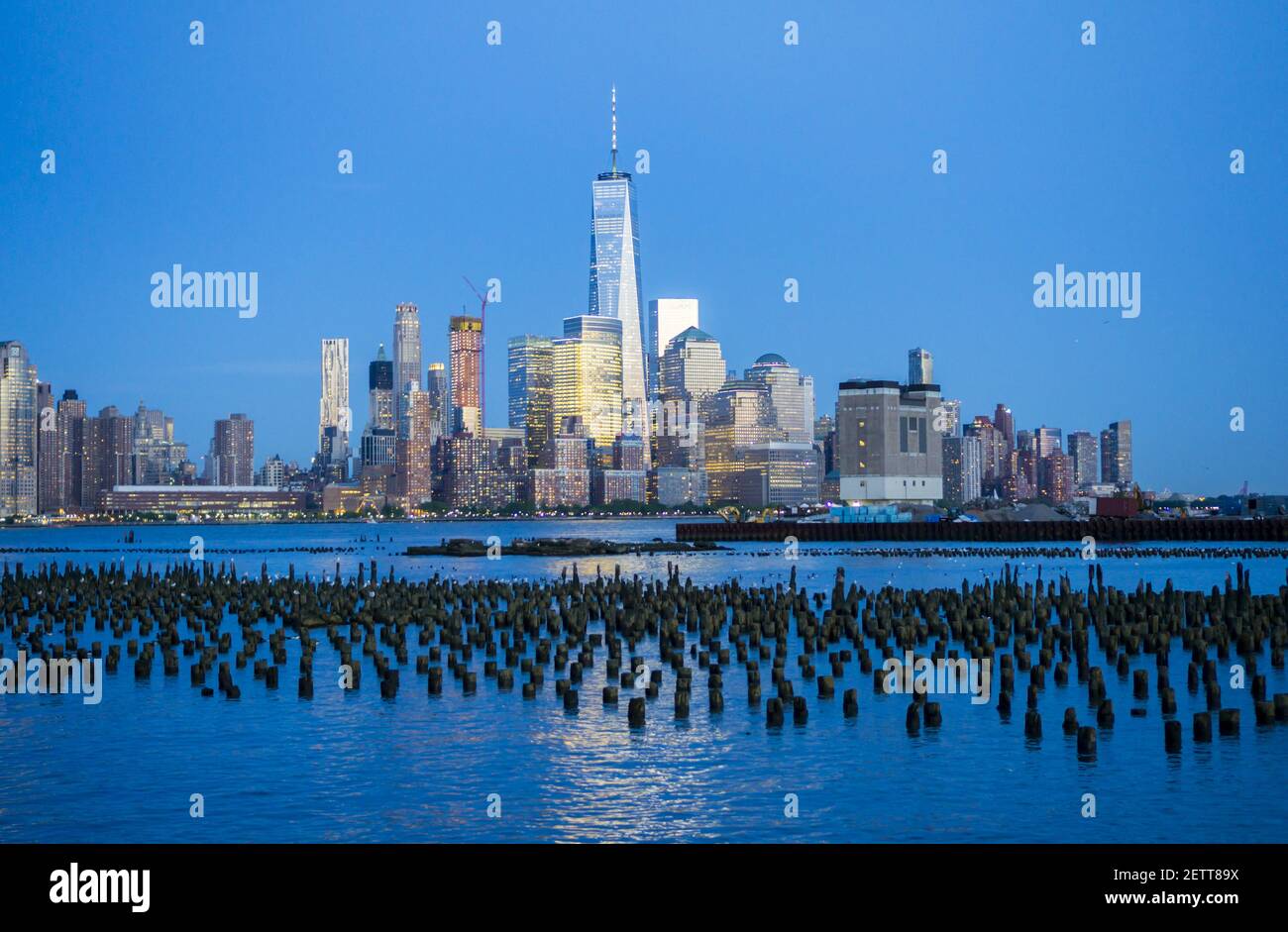 The Lower Manhattan Skyline Of New York With One World Trade Center On