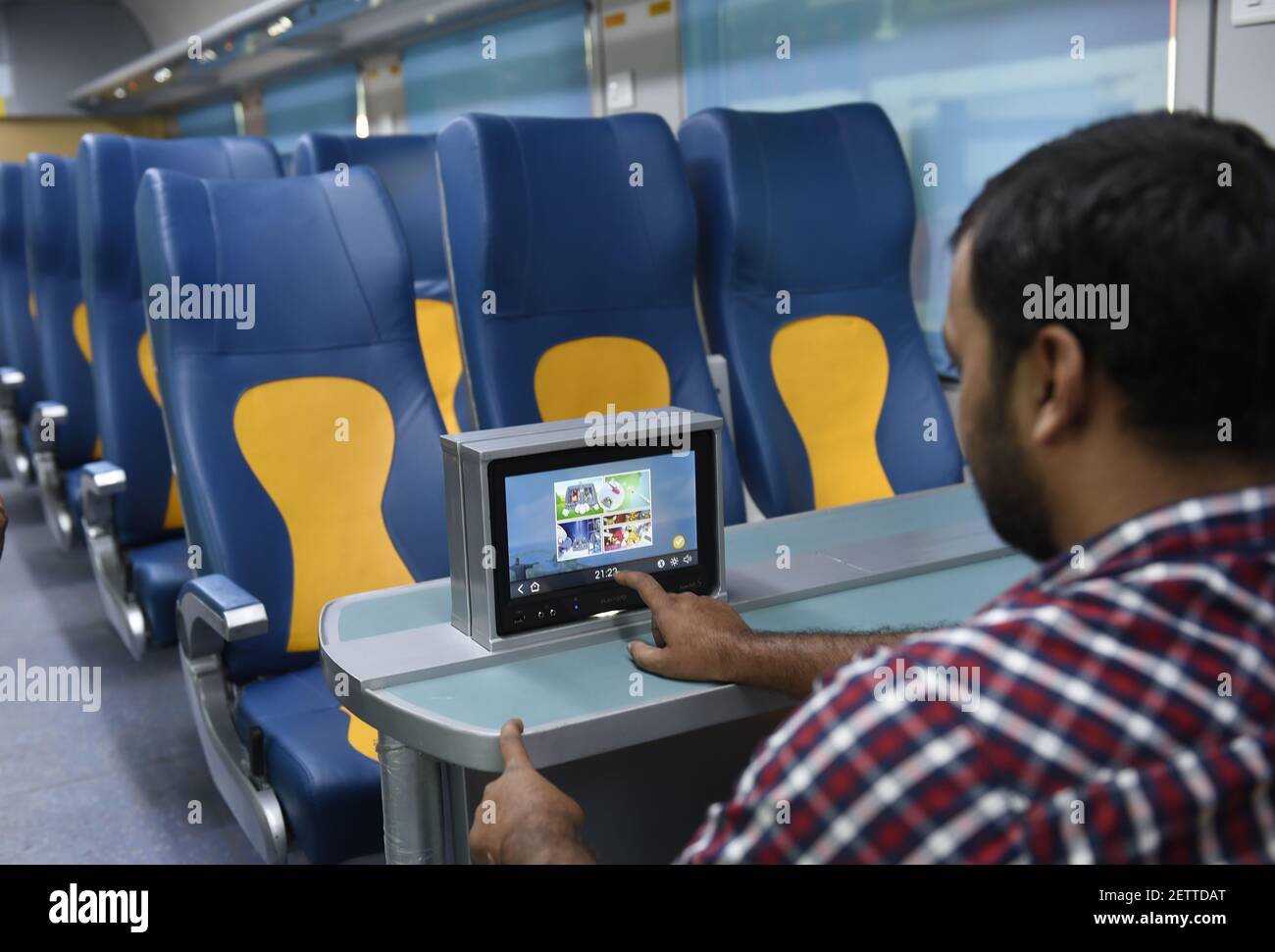 NEW DELHI, INDIA - MAY 19: A person checking LED TV during inspection ...