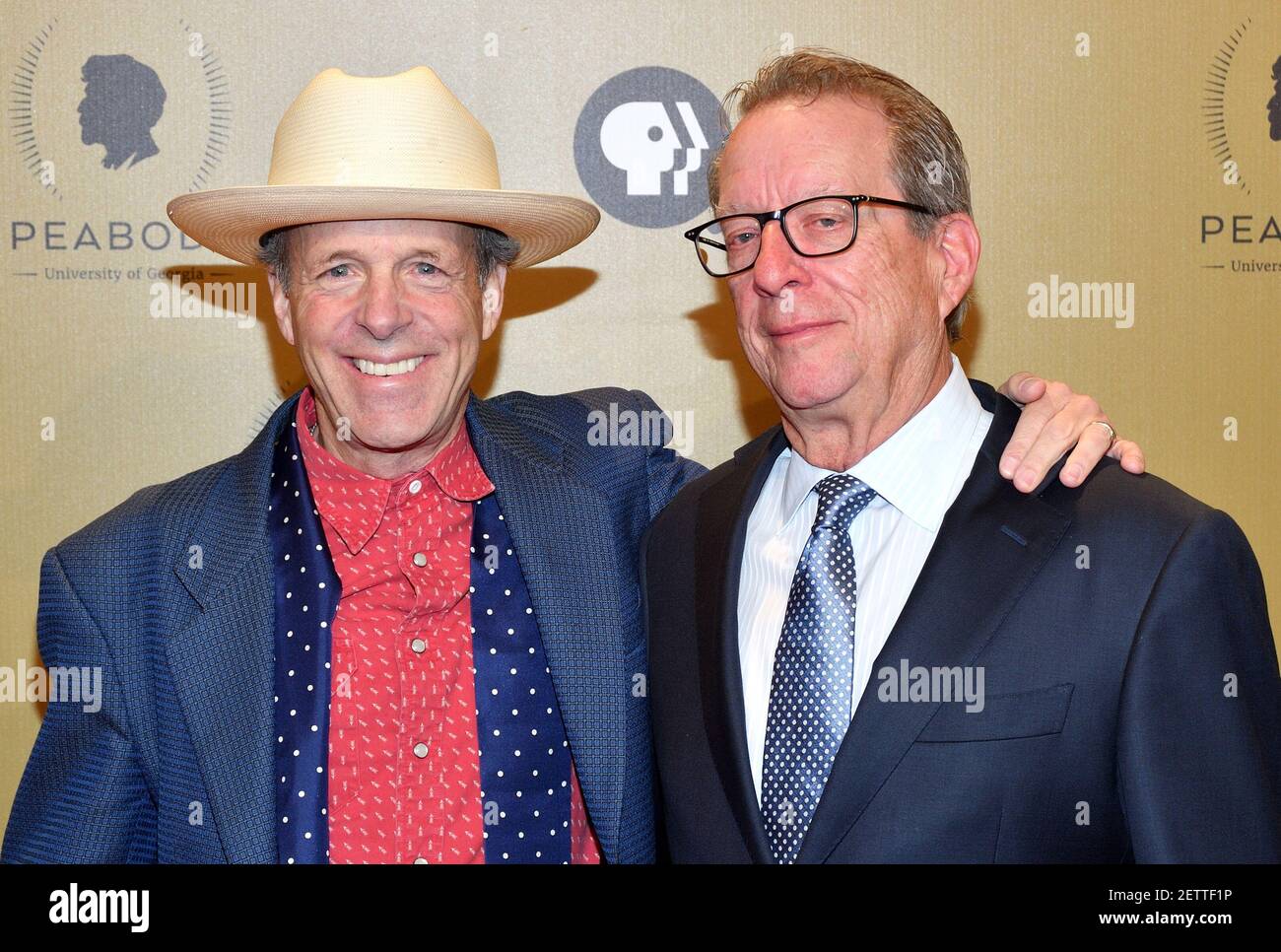L-R: Producer Mark McKinnon and journalist John Huey attend the 76th ...