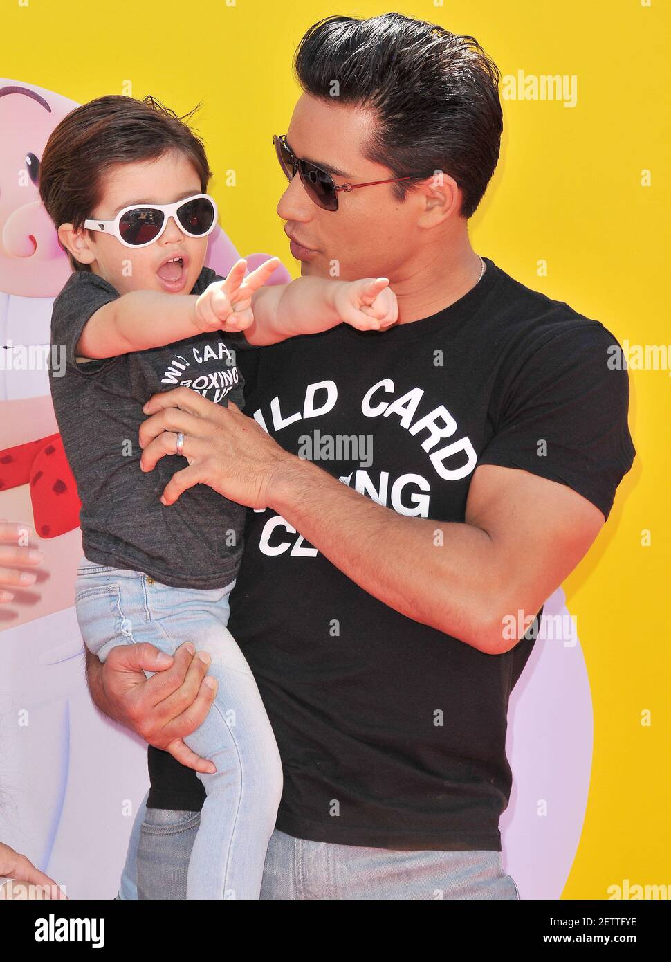 (L-R) Dominic Lopez and Mario Lopez arrives at "Captain Underpants: The ...