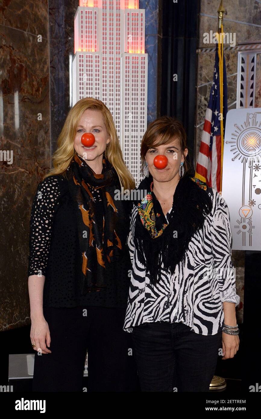(L-R) Actresses Laura Linney and Lucia Moniz light The Empire State ...