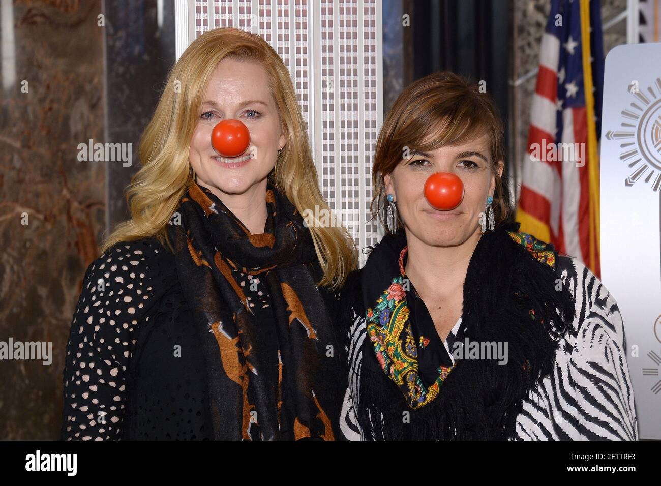(L-R) Actresses Laura Linney and Lucia Moniz light The Empire State ...