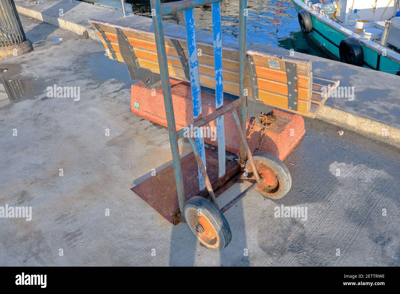 Old style small manuel carrying and carriage made of metal and it is ...
