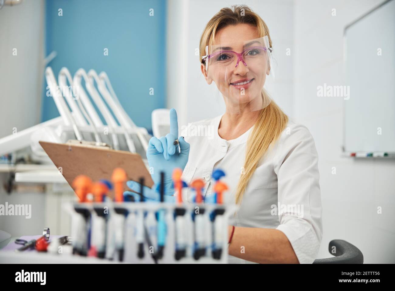 Dental practitioner asking to pay attention to important information ...