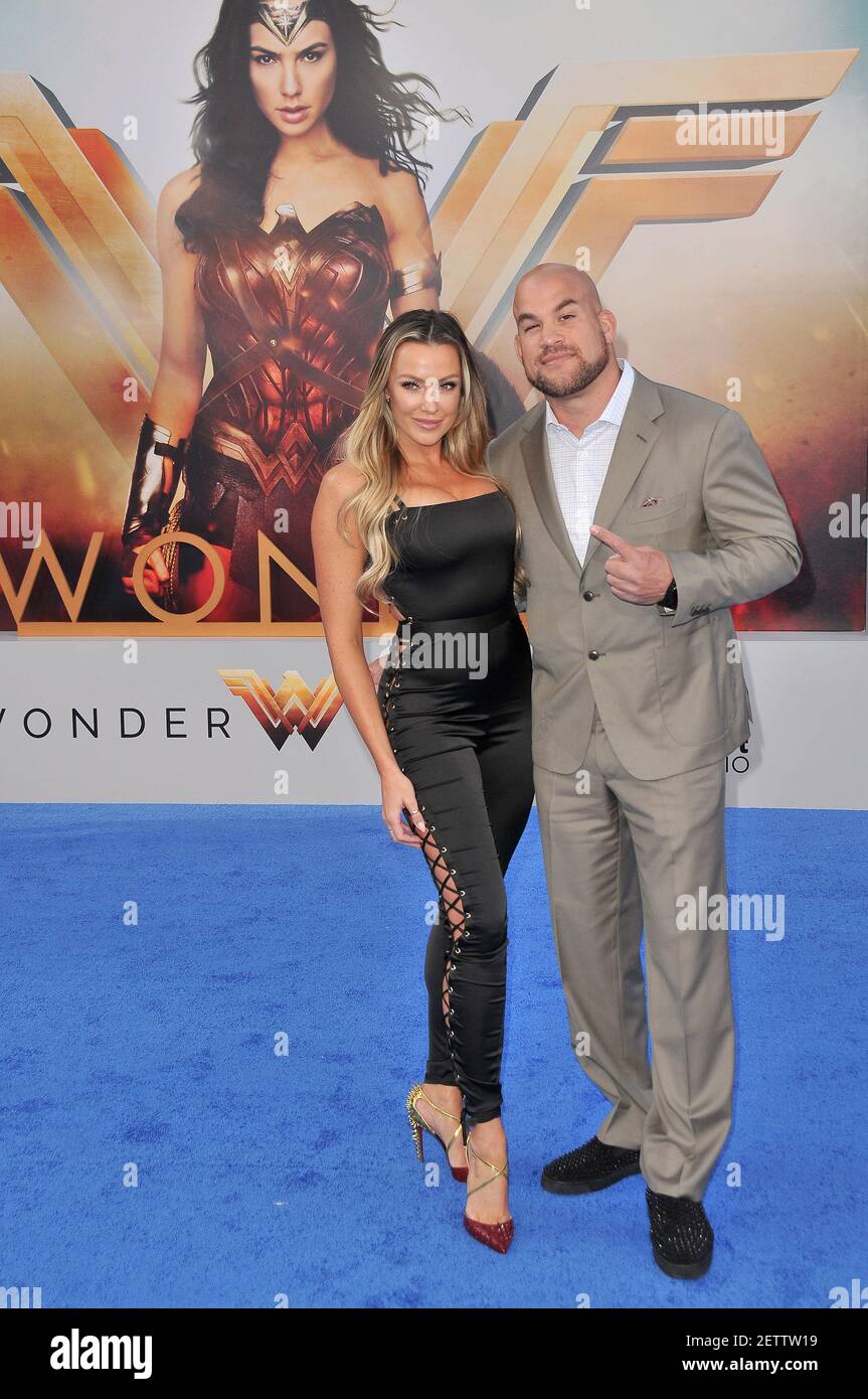 (L-R) Amber Nichole Miller and Tito Ortiz arrives at the "Wonder Woman ...