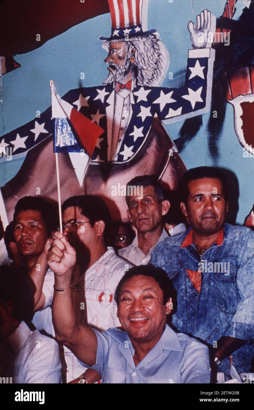 In front of a mural depicting an evil Uncle Sam, Panamanian dictator ...