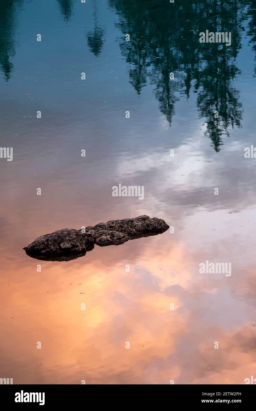 sunset on Carezza Lake in Trentino Alto Adige in Italy Stock Photo - Alamy