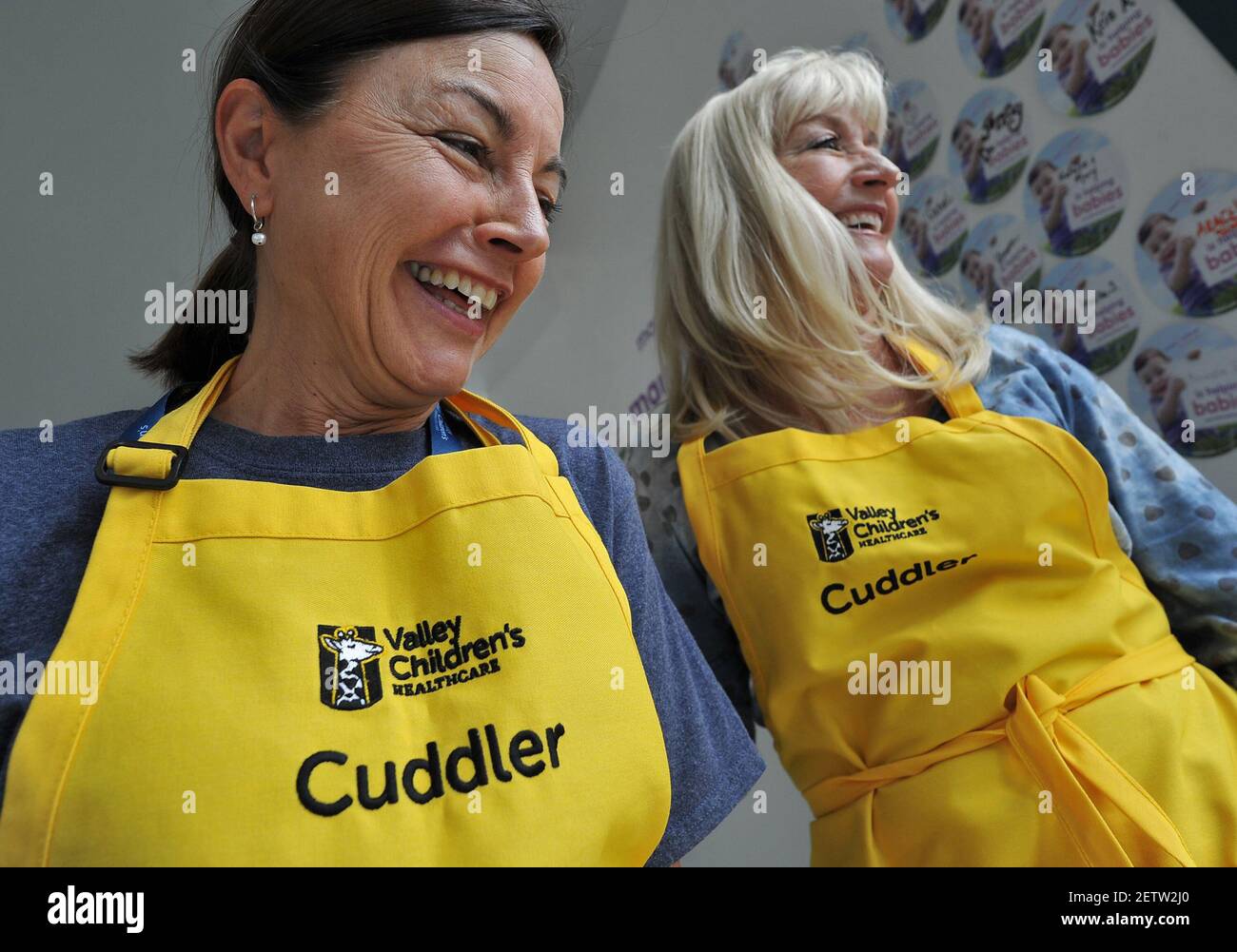 Valley Children's Hospital volunteer cuddlers Trina Rolph, left, and ...