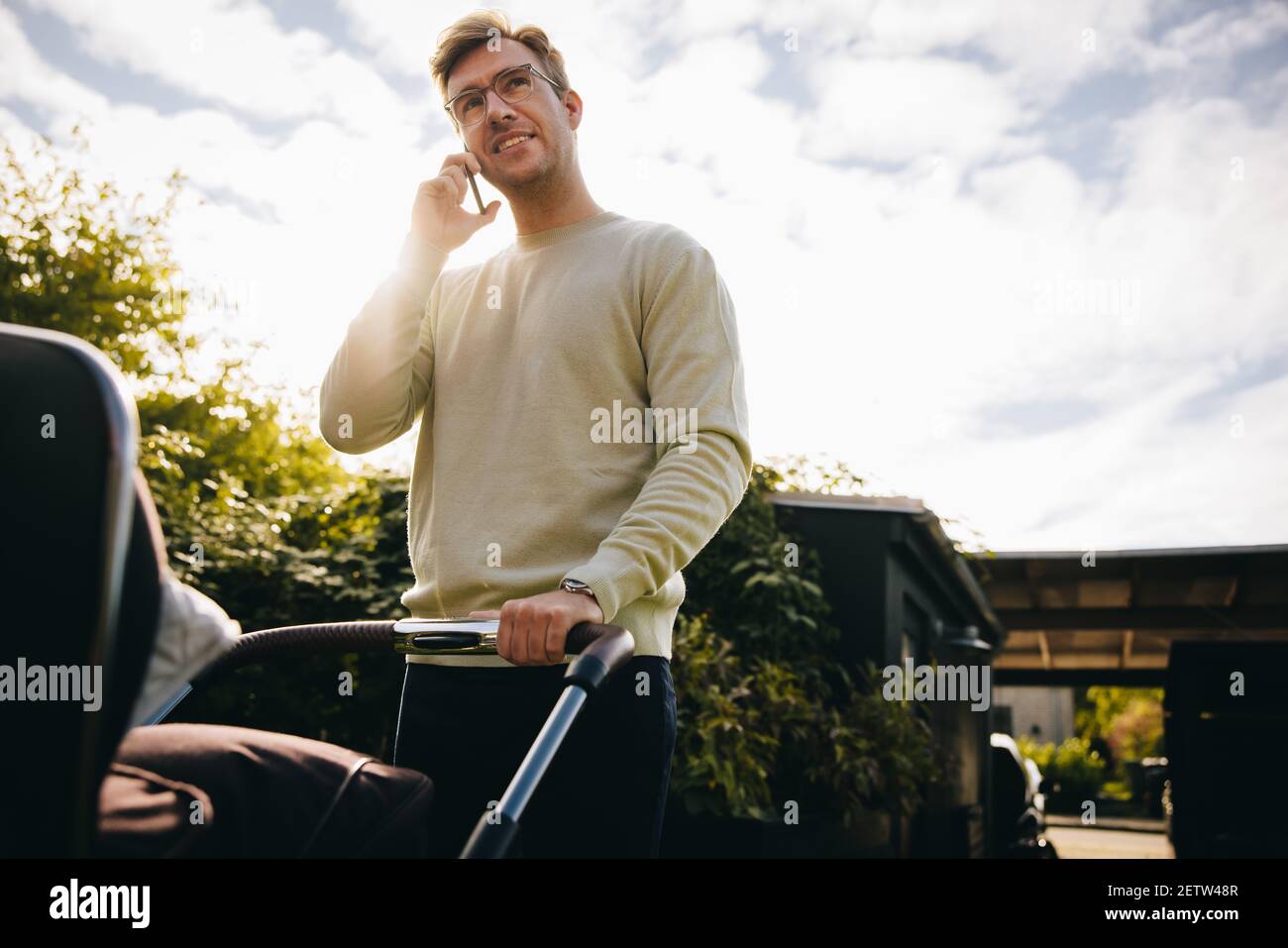 Dad pushing pram hi-res stock photography and images - Alamy