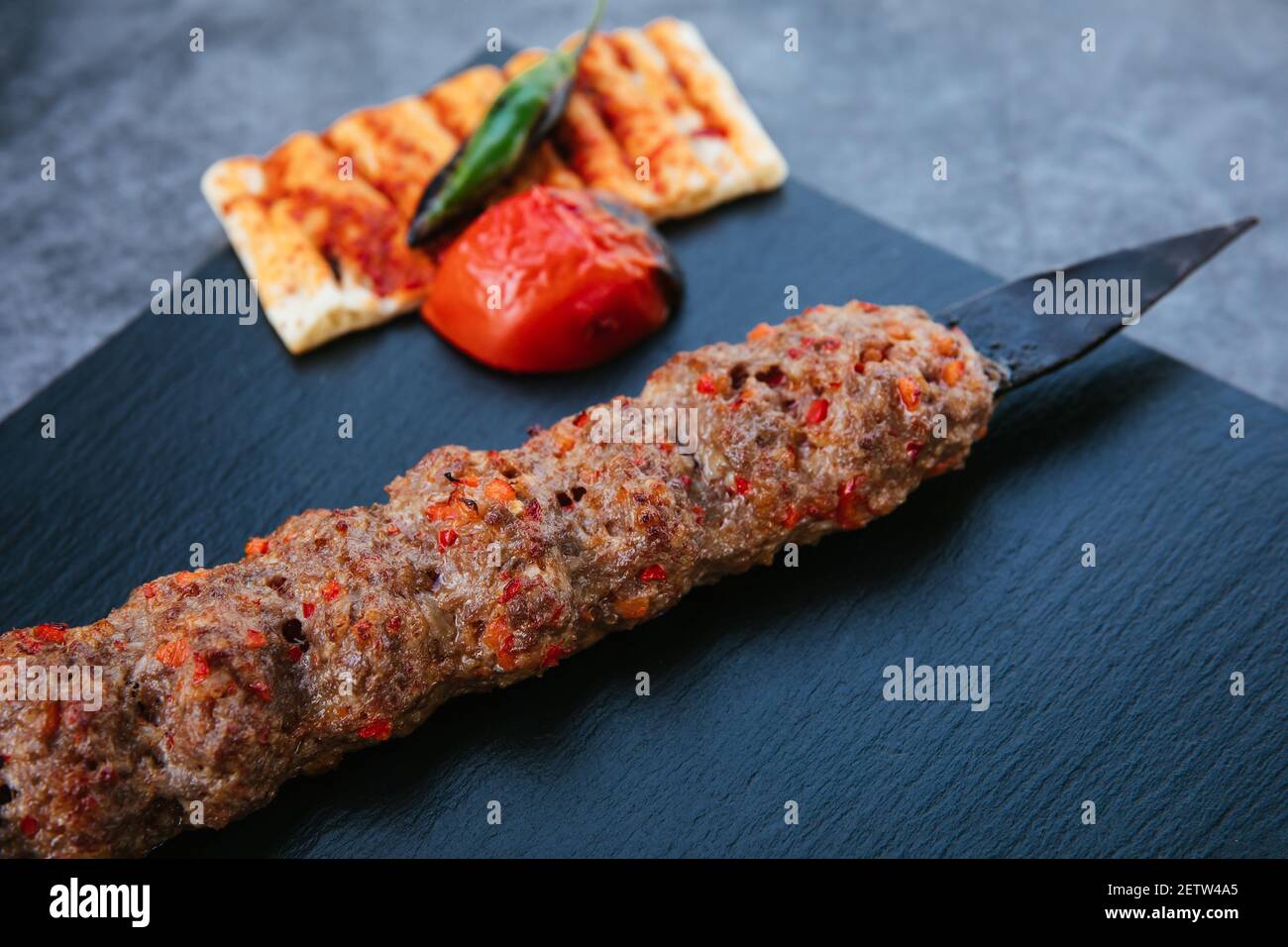 Traditional Turkish grilled shish kebab or kebap. Delicious Adana kebab ...